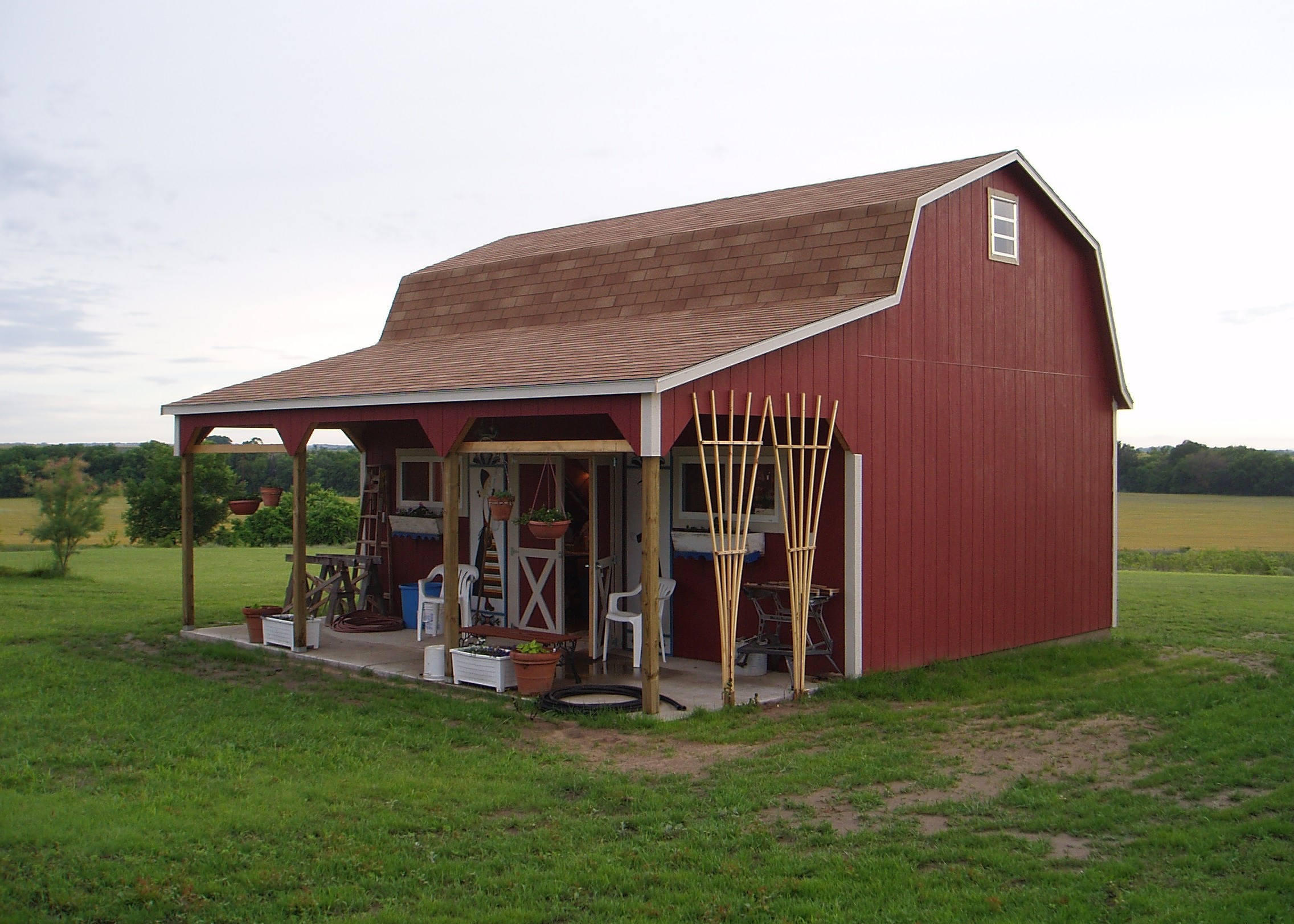 16x24 Elite Lofted Barn with 8x24 Porch 9176 - Sturdi-Bilt